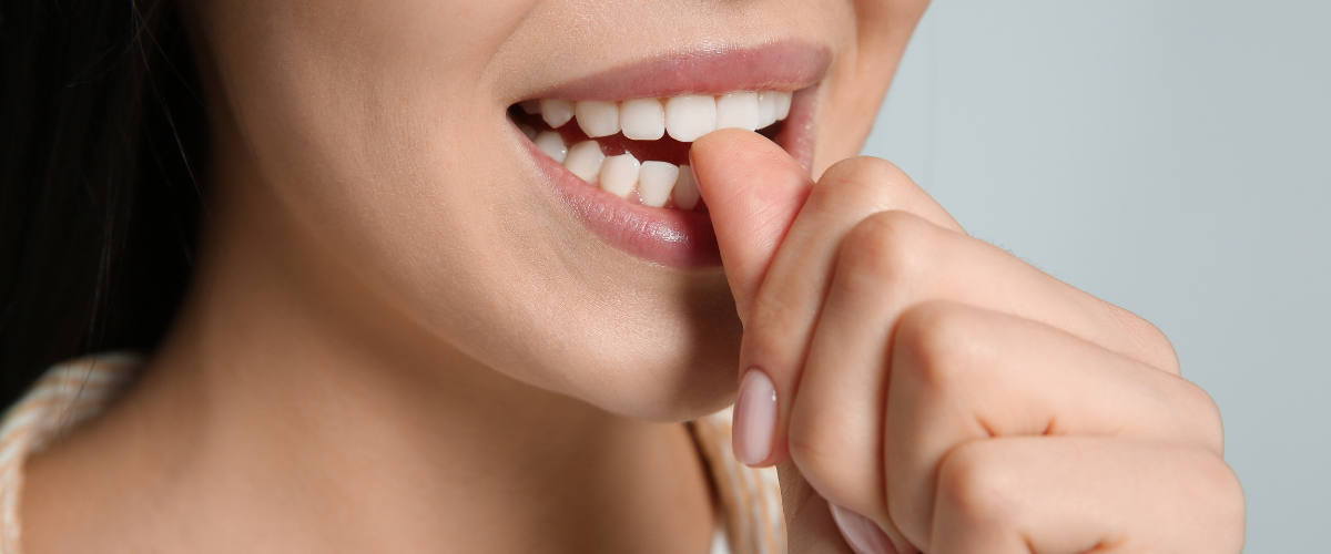 Did you know that nail-biting affects your dental health?